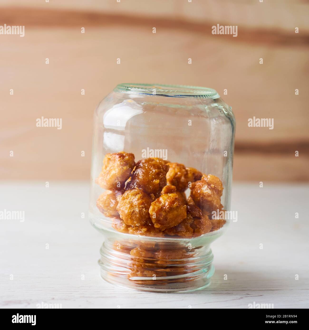 closeup of some nueces de macadamia garrapinadas, spanish candied ...