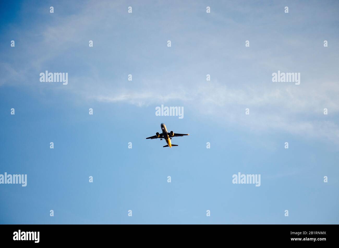 Airplane in The Sky Stock Photo - Alamy