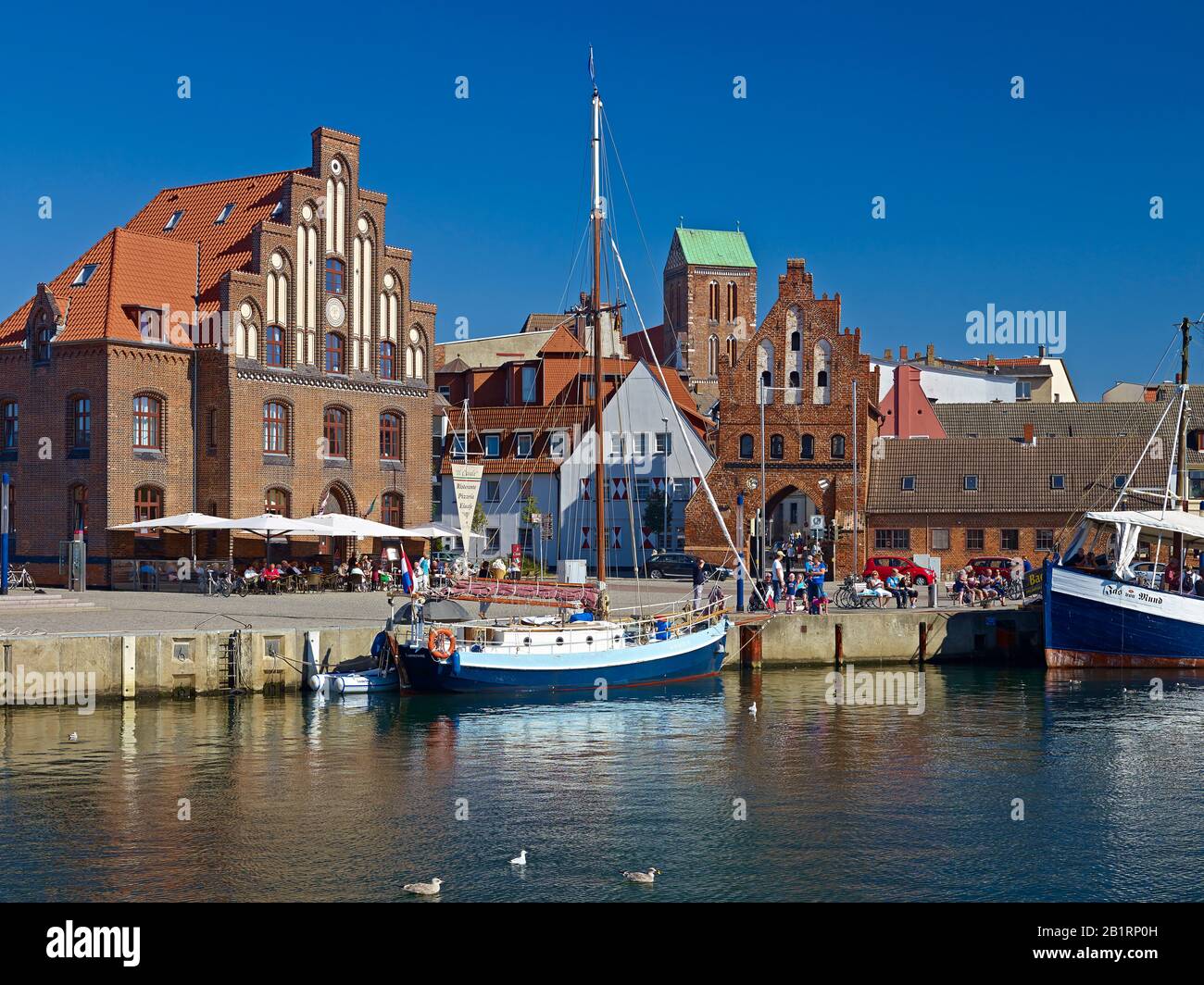 Old harbour with water gate and nikolai church hi-res stock photography ...