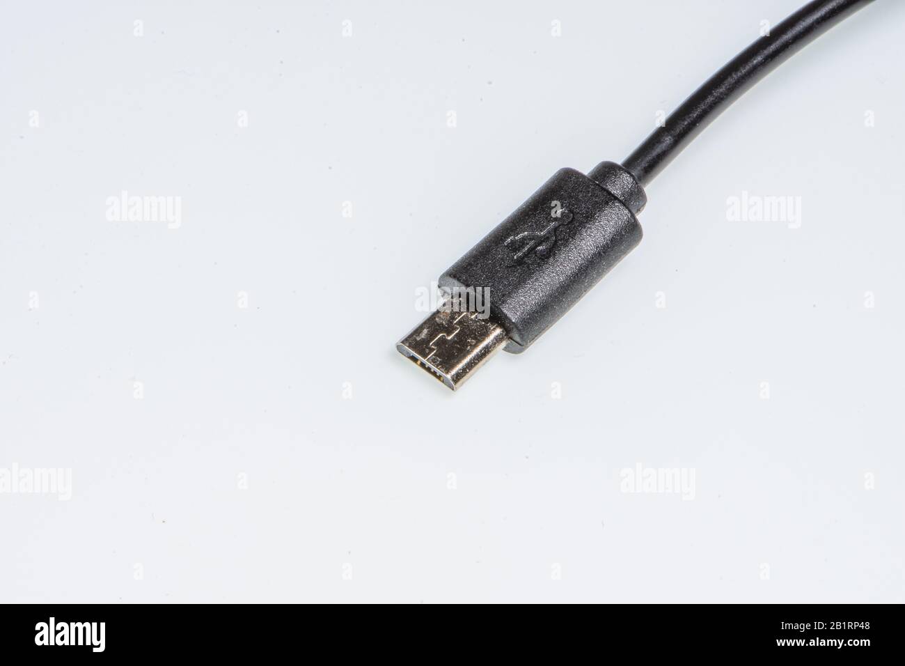 detail of a black micro usb connector on a white background Stock Photo ...