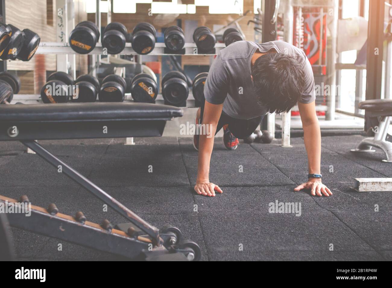 Sport man doing push ups exercise in gym. Workout concept. Fitness ...