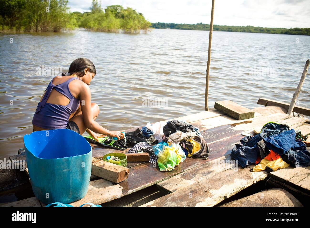 Girl washing in river hi-res stock photography and images - Alamy