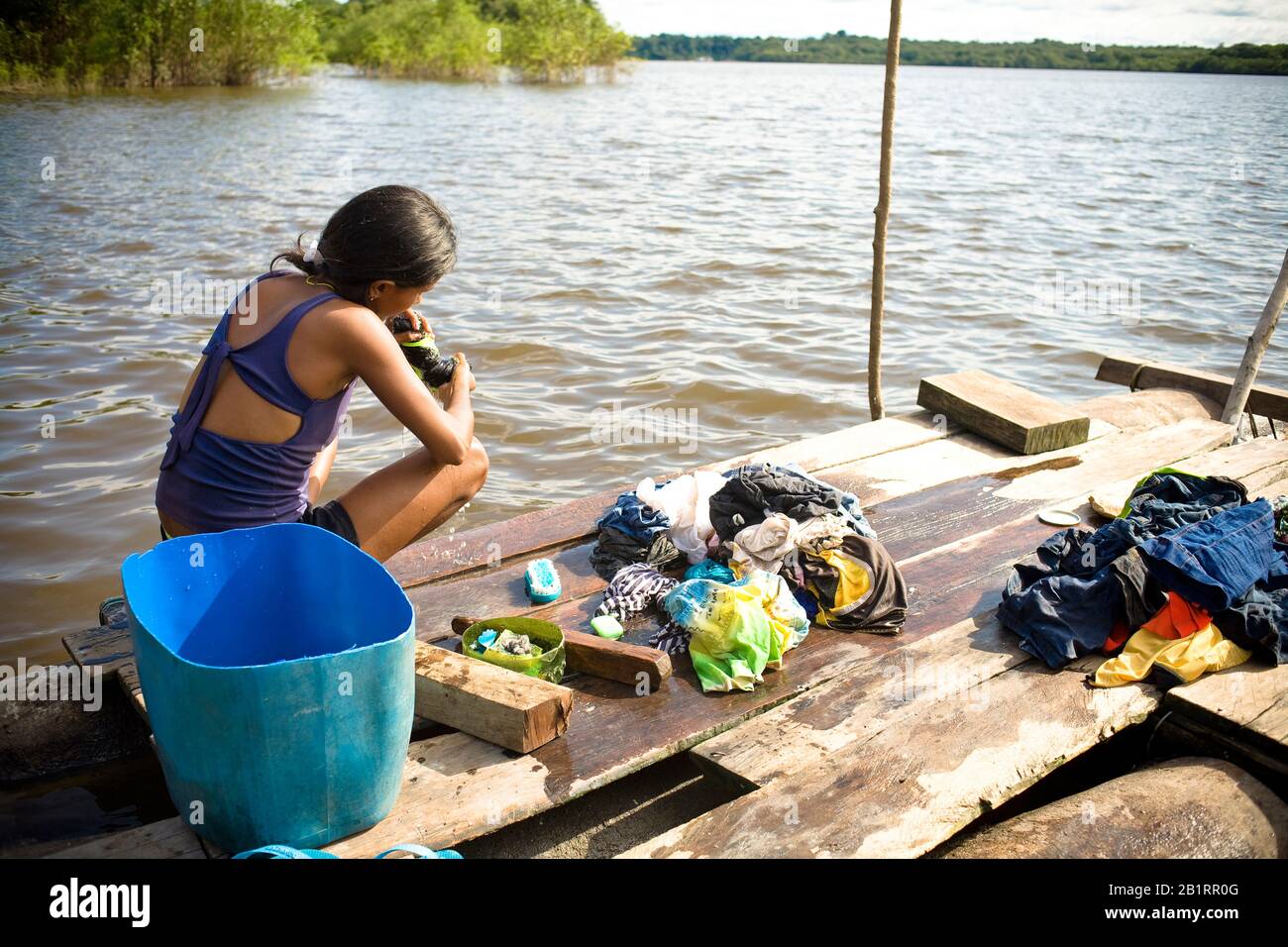 Girl washing in river hi-res stock photography and images - Alamy
