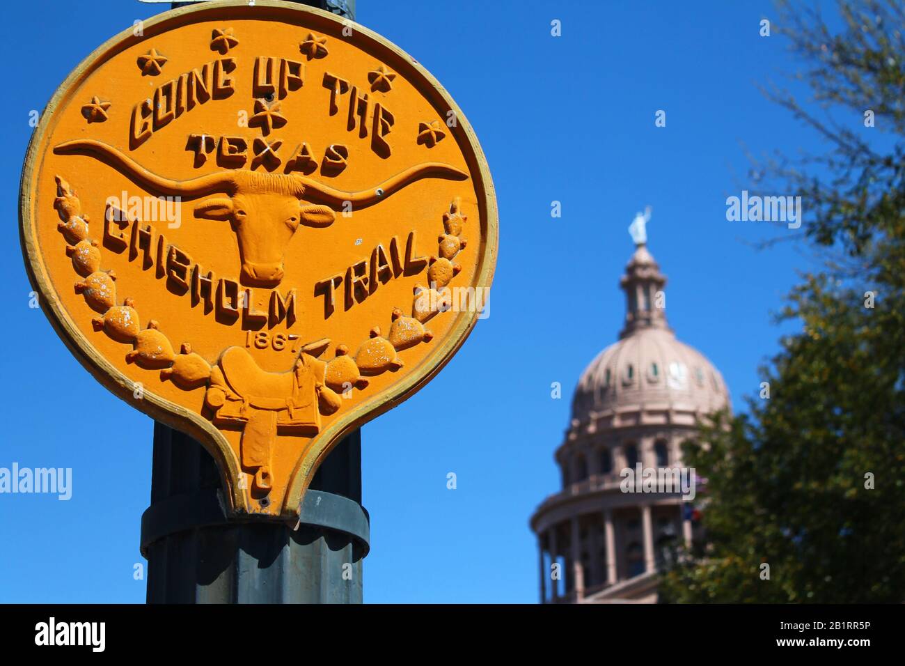 Going up the Texas Chisholm trail sign Stock Photo - Alamy