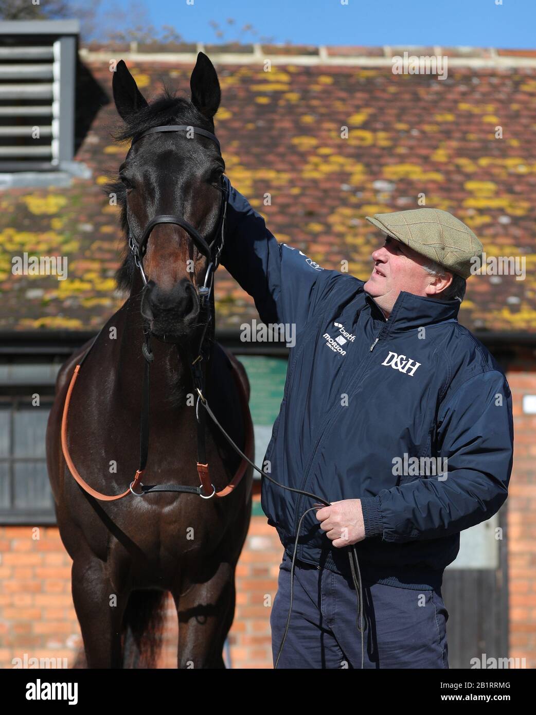 Trainer Paul Nicholls poses for a photograph with Clans Des Obeaux in ...