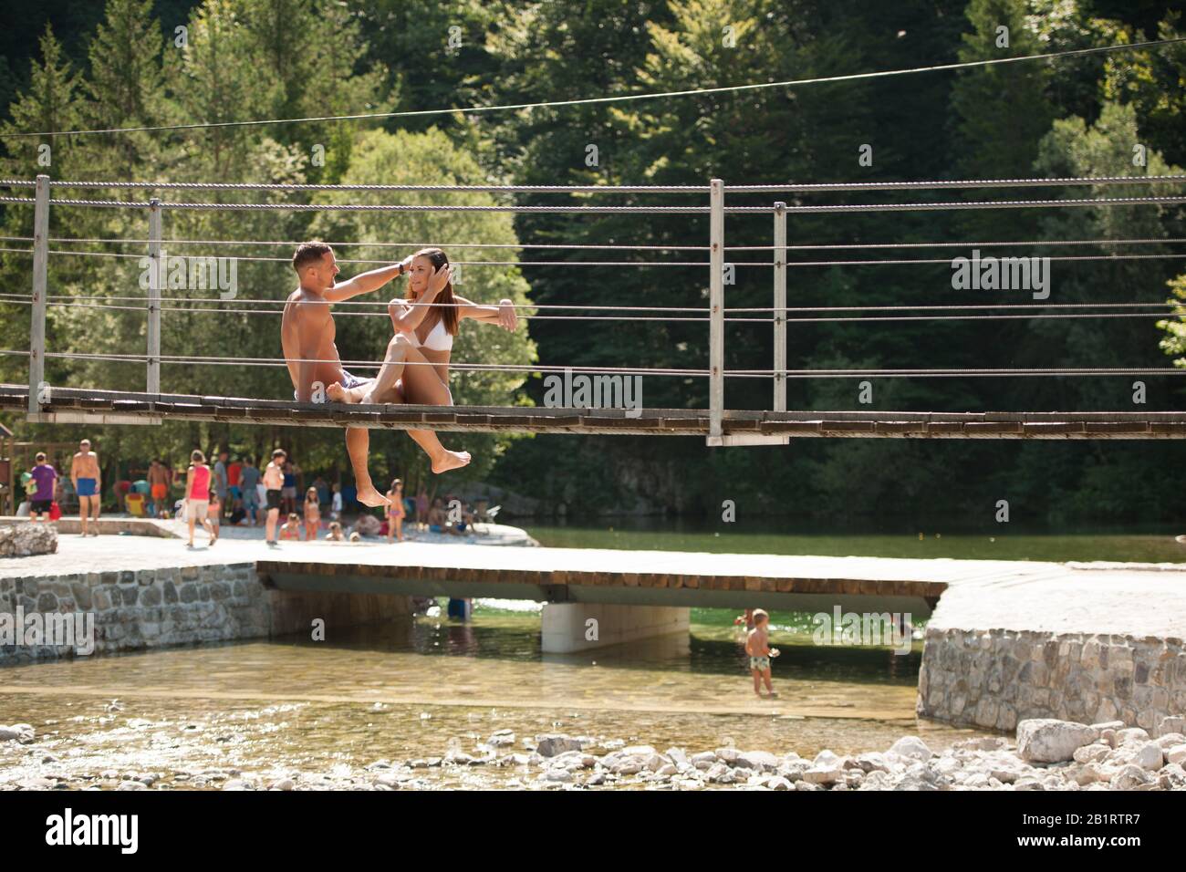 Couple looking over a bridge hi-res stock photography and images - Alamy