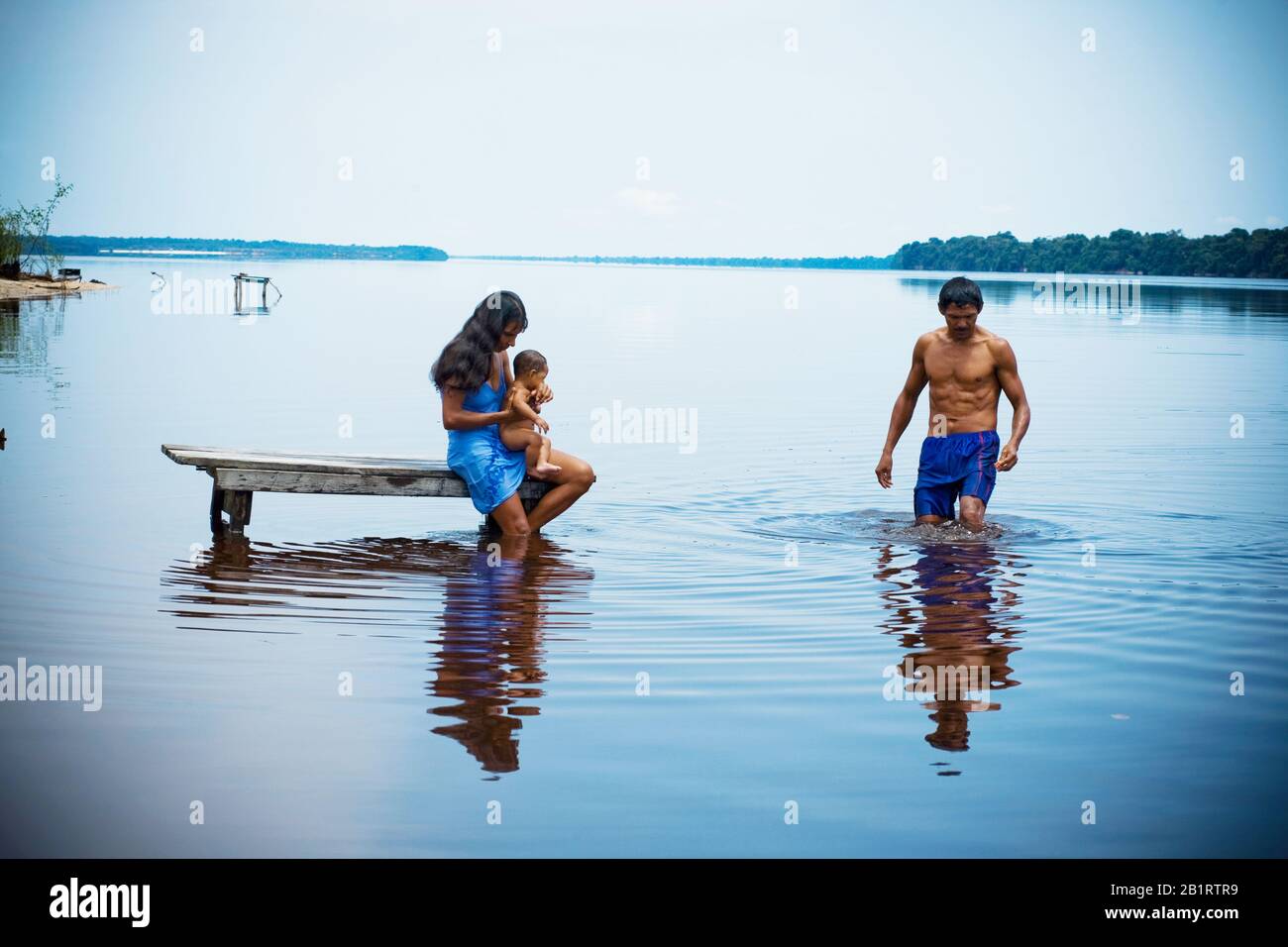Father and son taking a bath in a river hi-res stock photography and ...