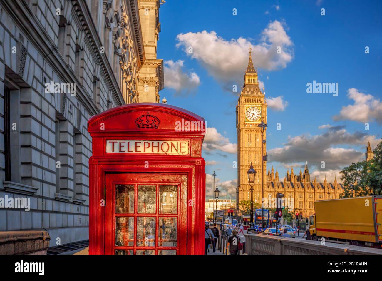 London with red phone booth against Big Ben in England, UK Stock Photo ...