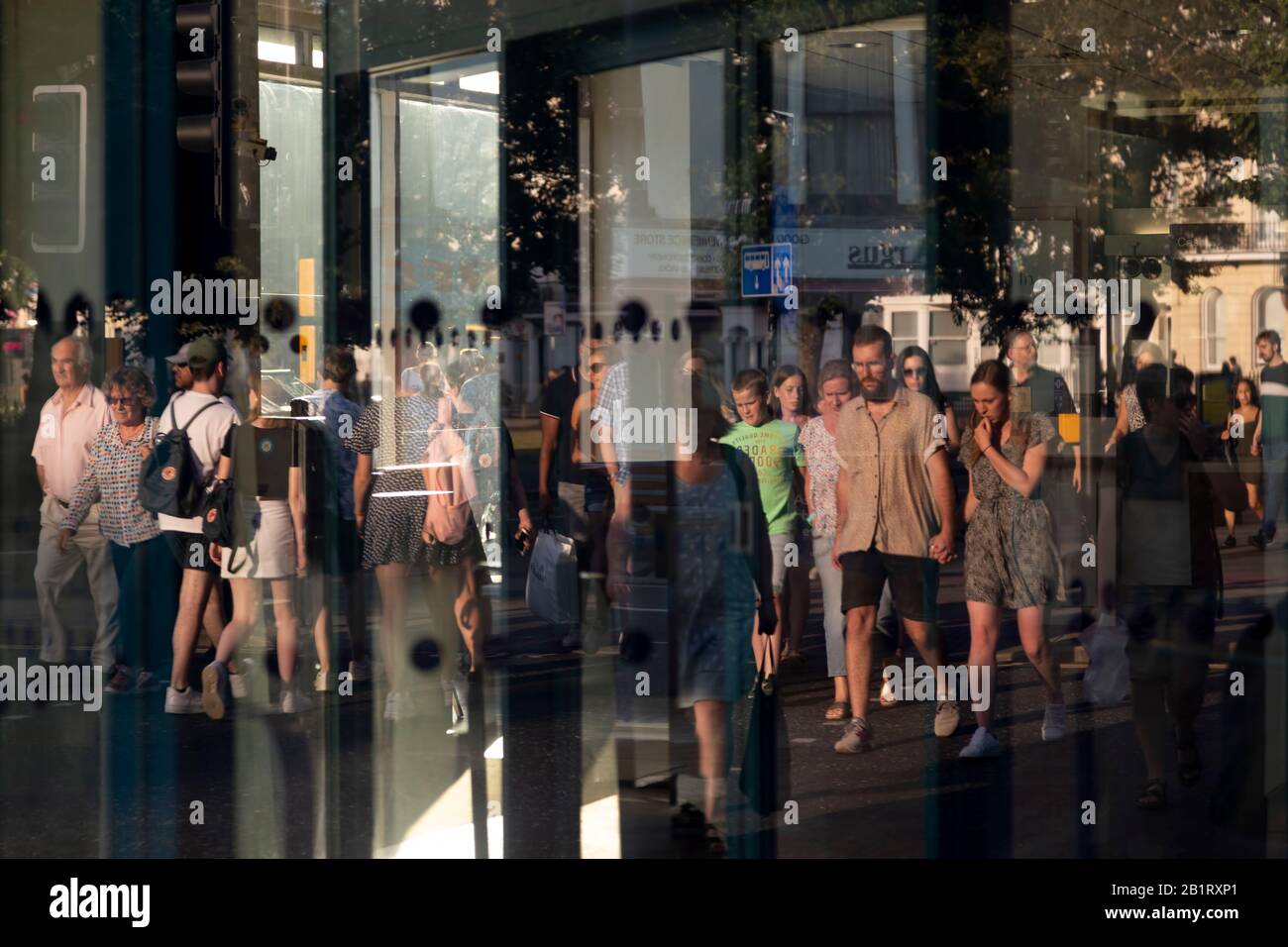 street crowd reflected and distorted in shop window Stock Photo - Alamy