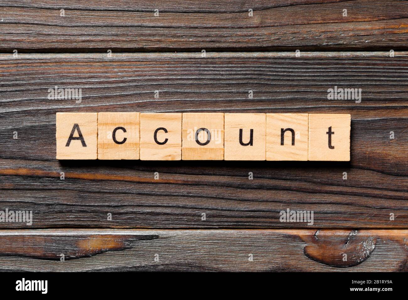 Account word written on wood block. Account text on wooden table for ...