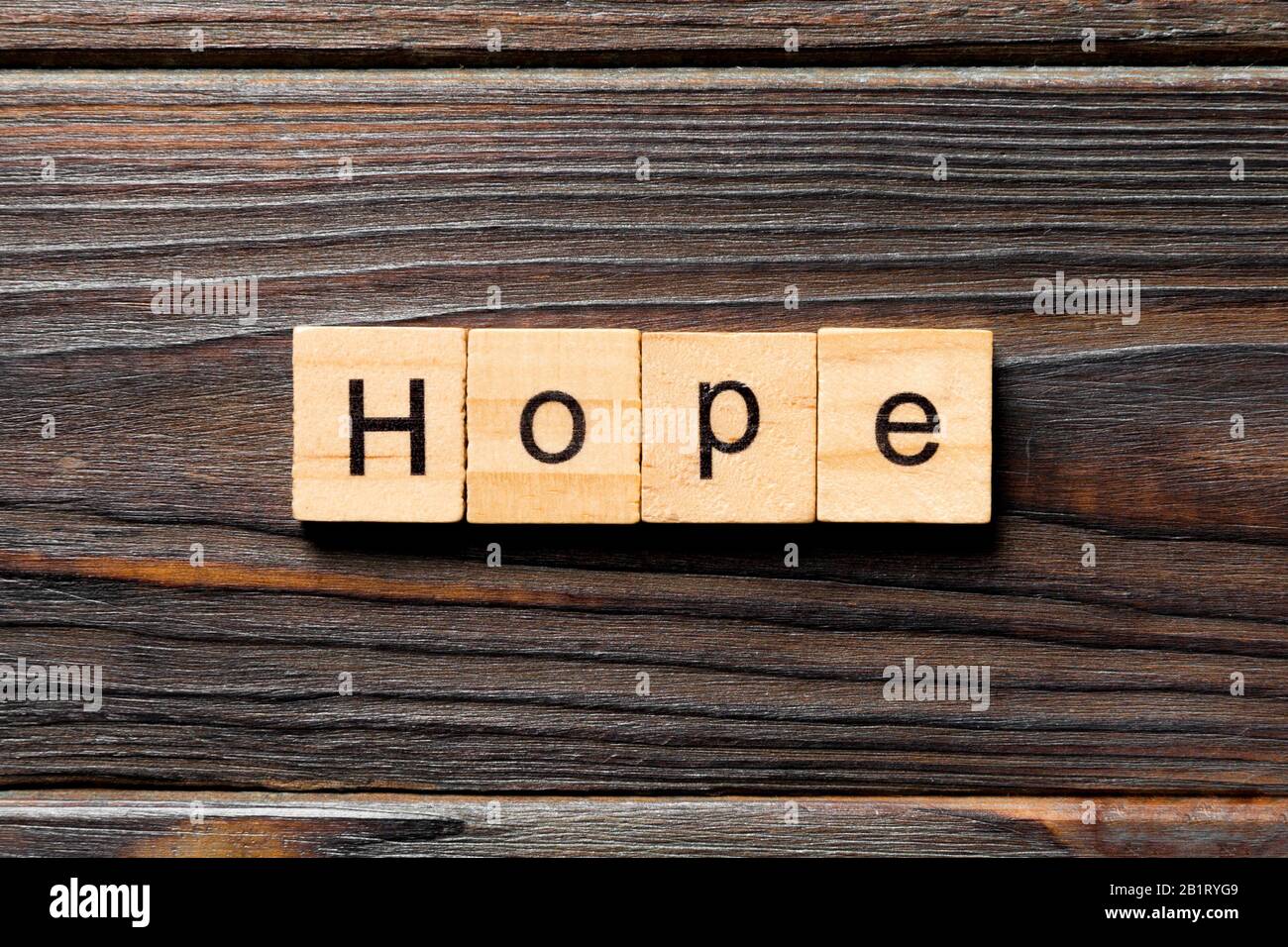 hope word written on wood block. hope text on table, concept Stock ...