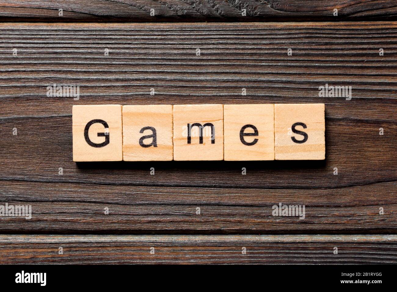 games word written on wood block. games text on table, concept Stock ...