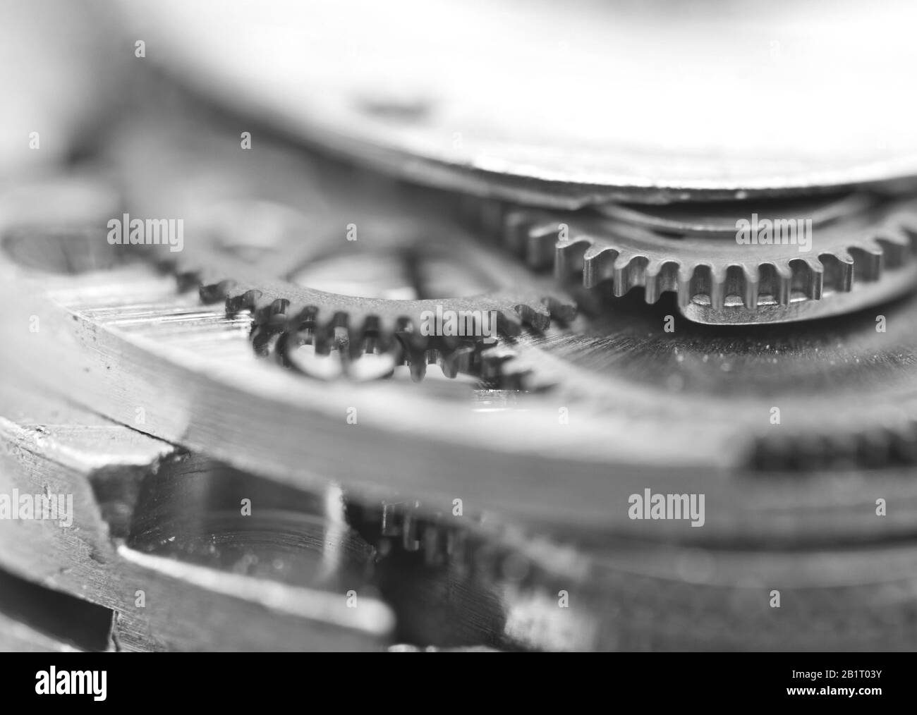 Black and white photography. Background with metal gear wheels ...
