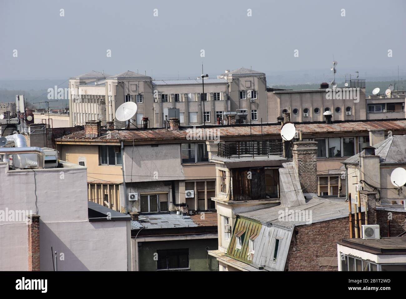 Sunny day and city rooftops of tall buildings Stock Photo - Alamy