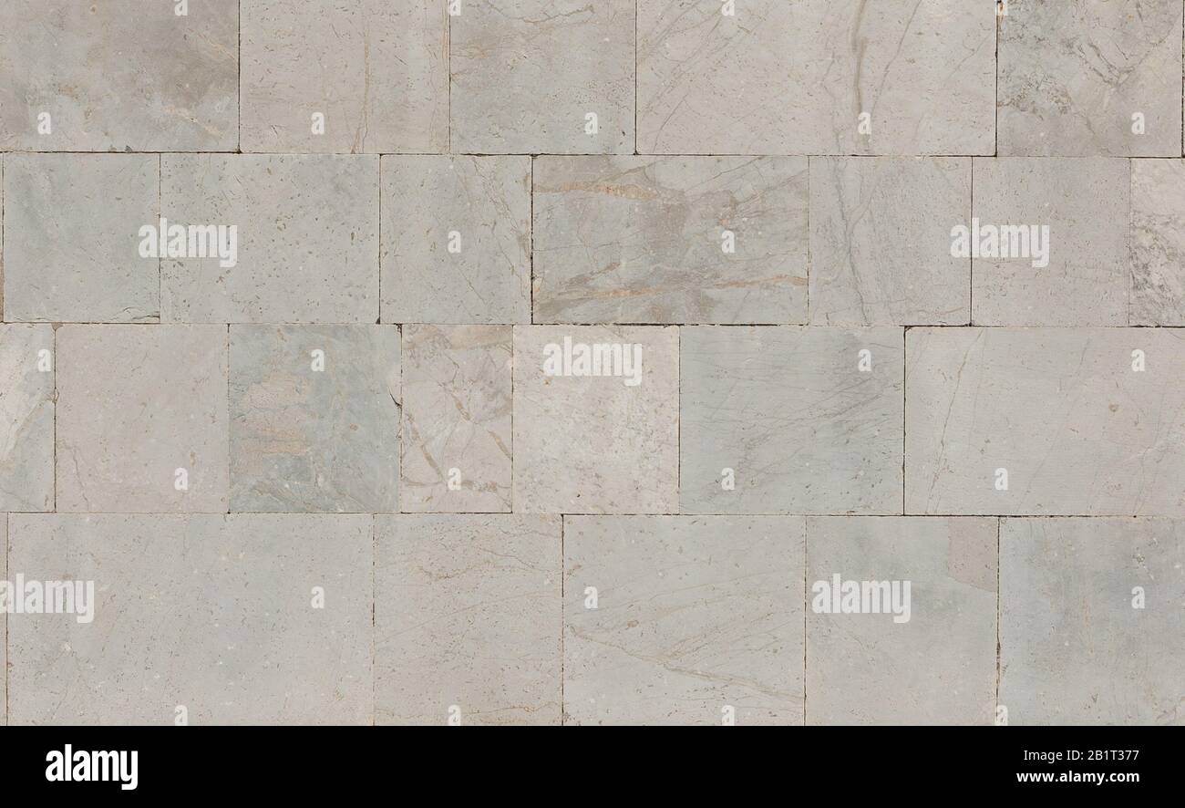 Old white marble block wall as background Stock Photo - Alamy