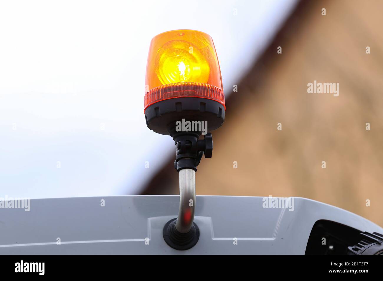 Orange flashing light on the transport on a blurred background Stock ...