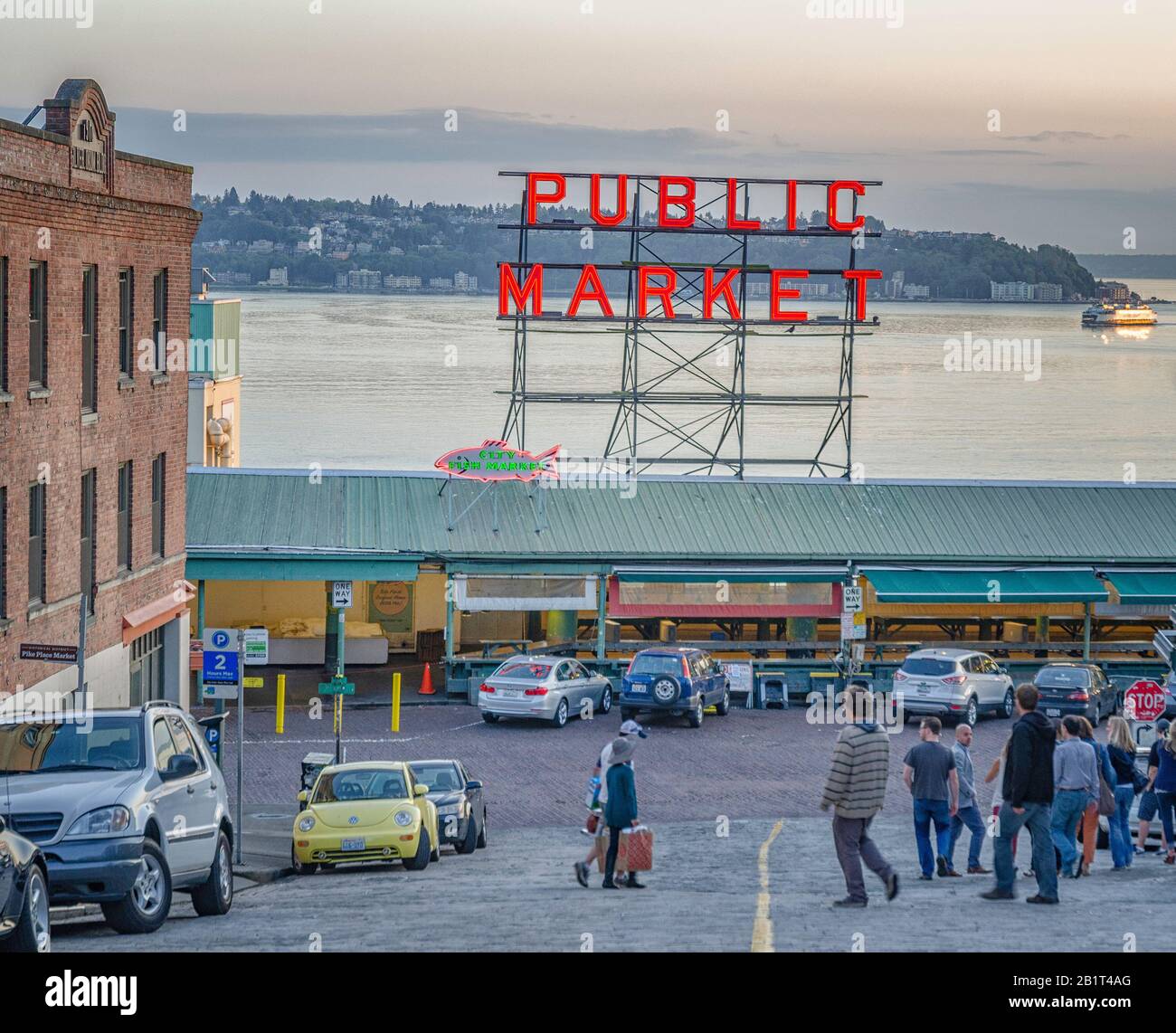 Seattle, WA, USA - June 1, 2014: Tourists visit the Pike Place Market ...