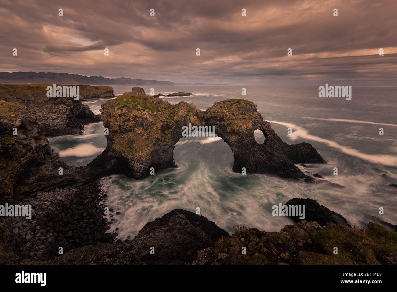 Gatklettur arch in Arnarstapi town in Snæfellsnes peninsula, West ...
