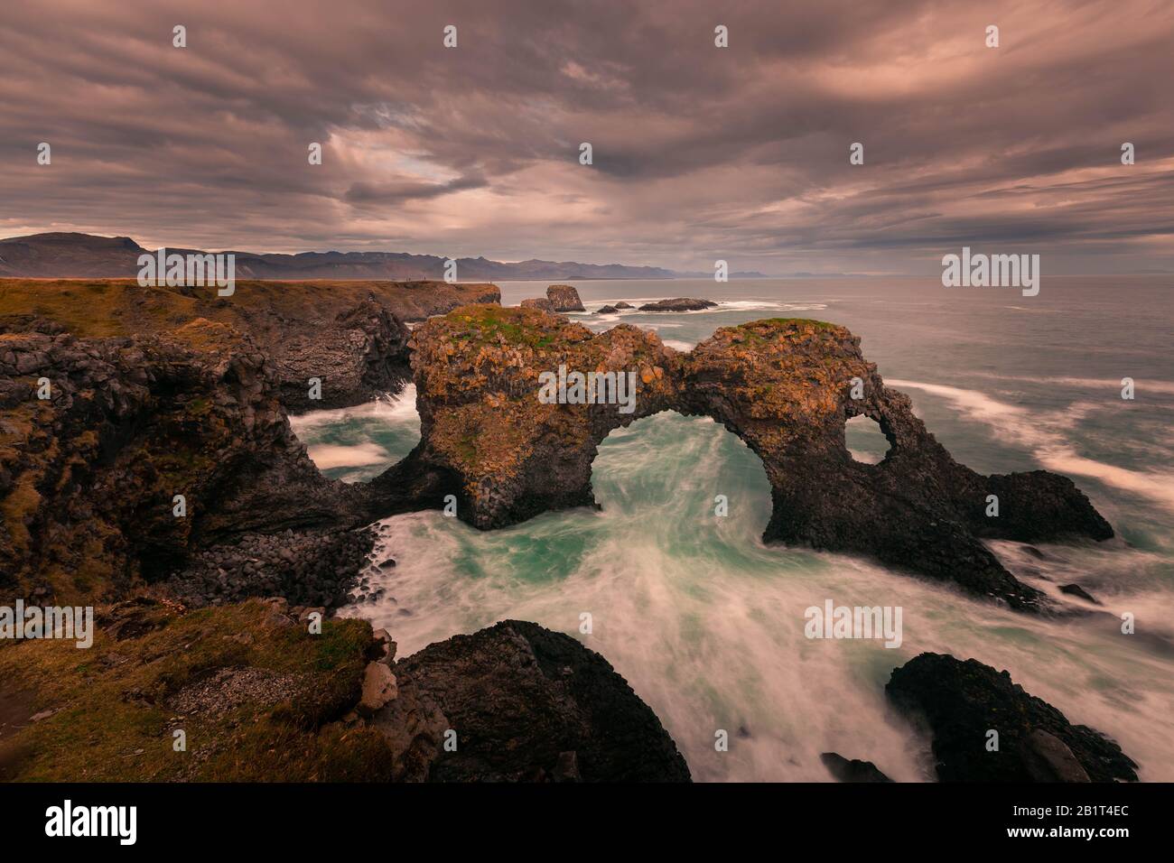 Gatklettur arch in Arnarstapi town in Snæfellsnes peninsula, West ...