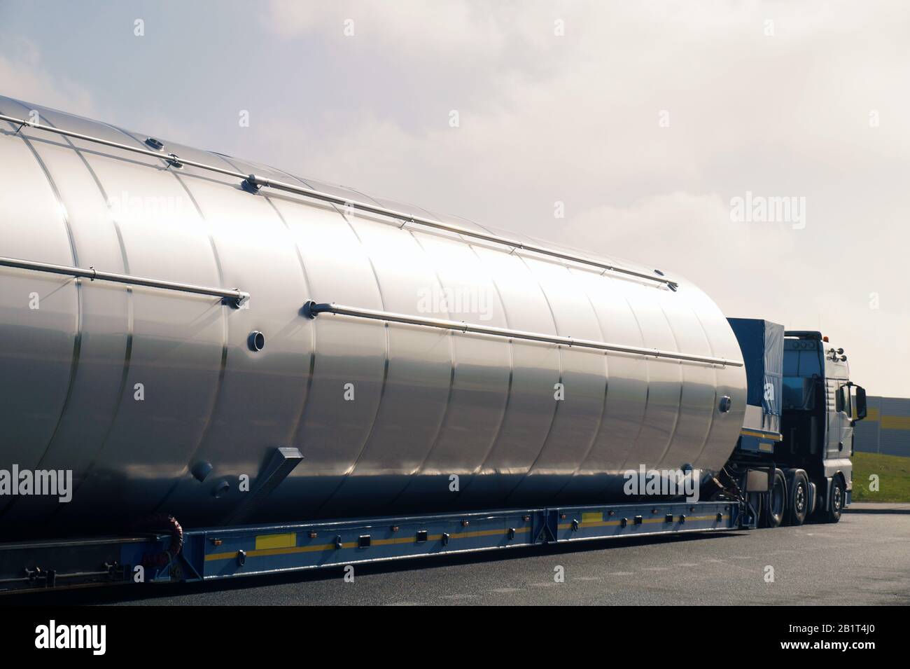 Road transport. A truck with an unusual, unusually long load on the ...