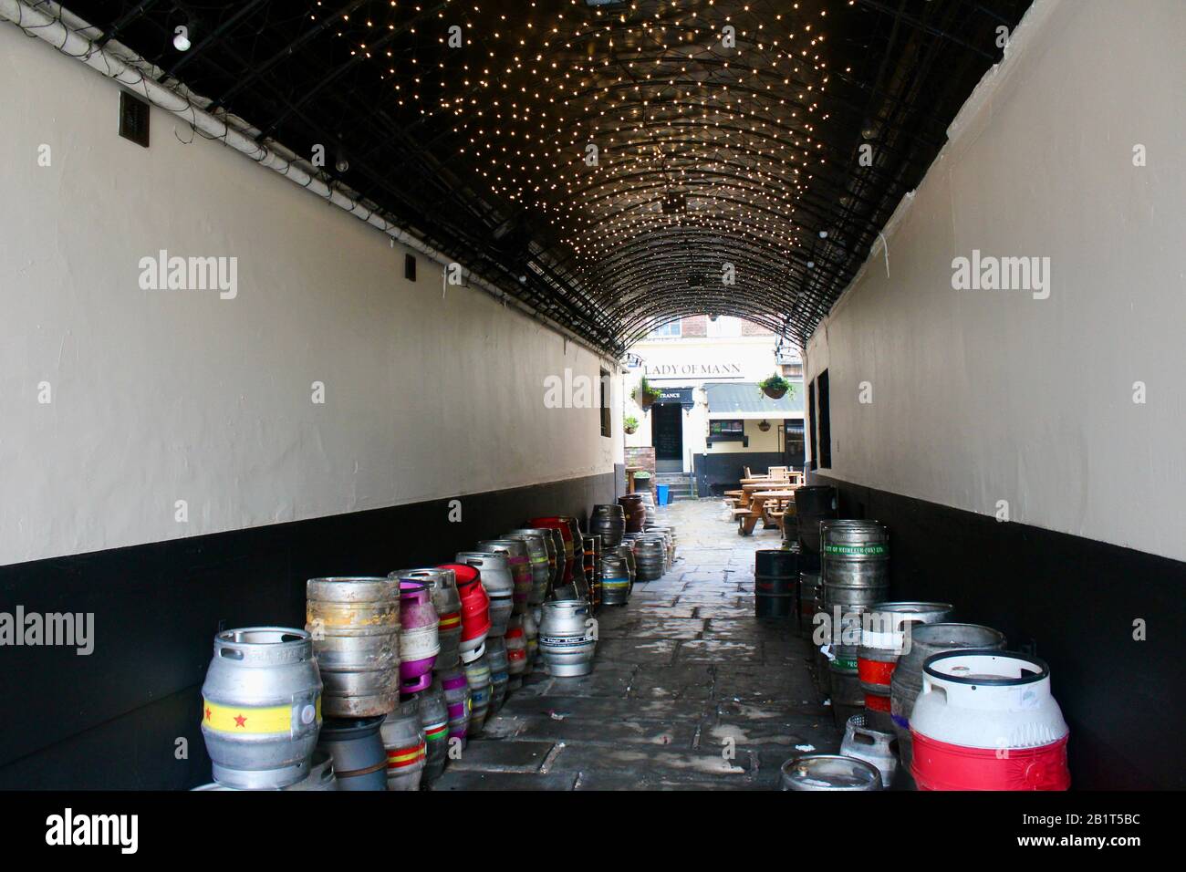 beer kegs lined up in an alley leading to lady of mann pub in liverpool ...