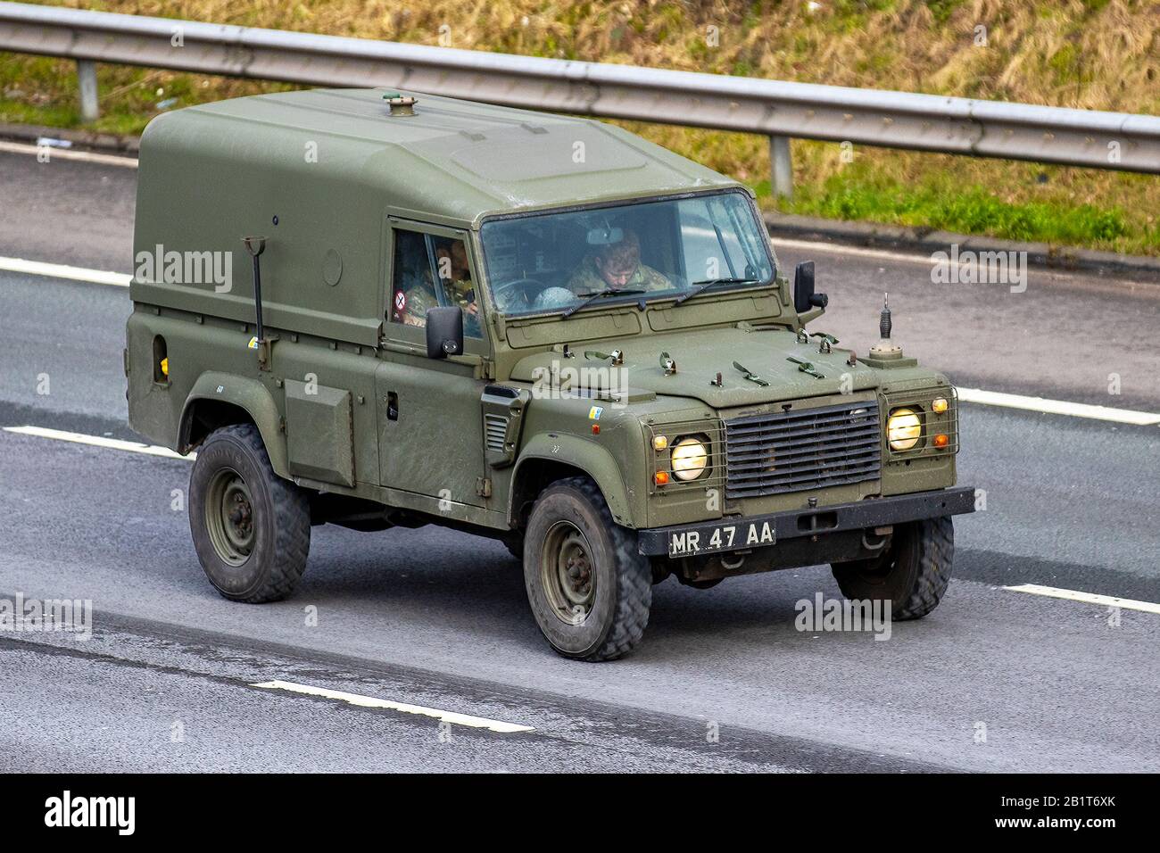 Green British Army military Land Rover; UK Vehicular traffic, transport ...