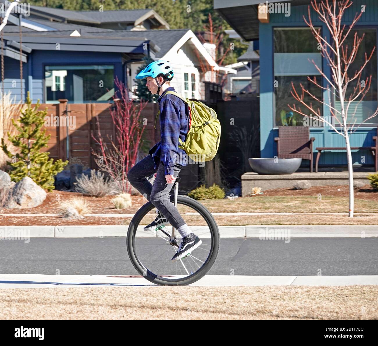 Man riding unicycle hi-res stock photography and images - Alamy