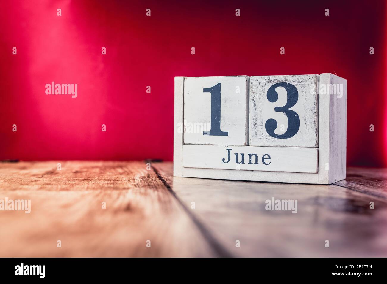 June 13th. Day 13 of month, calendar on business office table ...