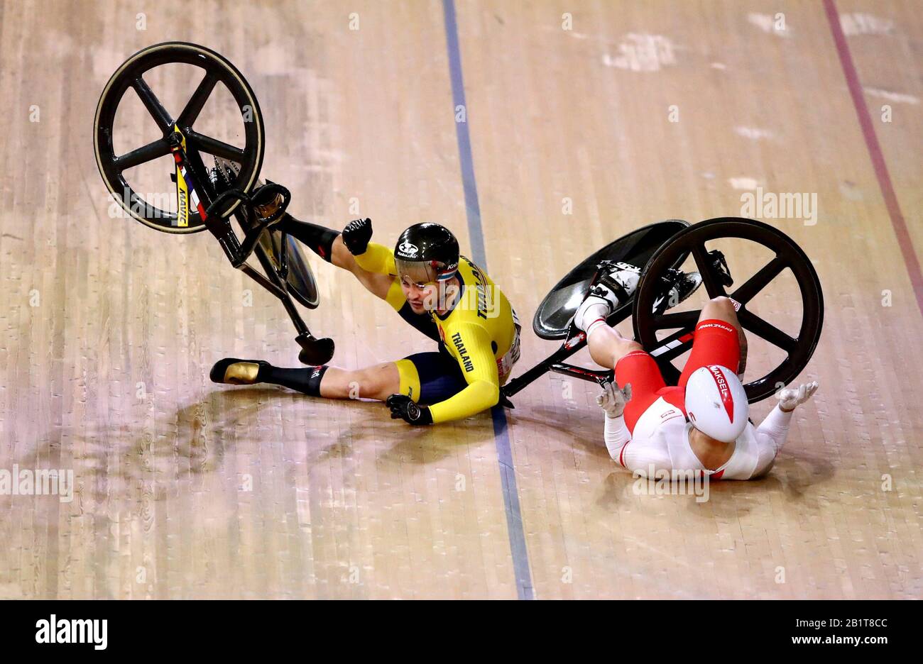 Poland's Krzysztof Maksel (left) and Thailand's Jai Angsuthasawit crash ...