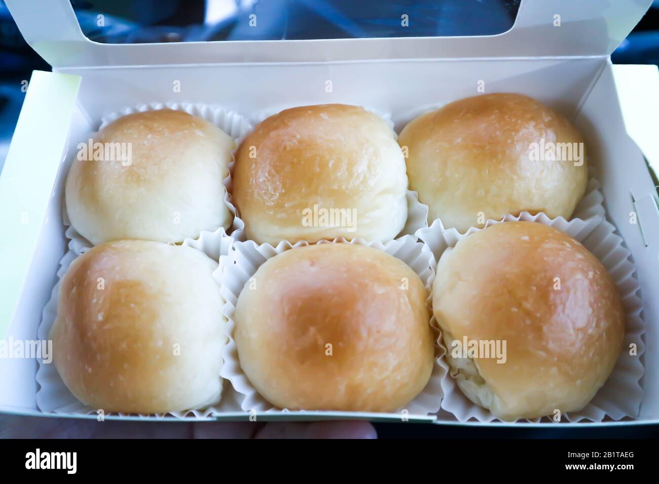 bun, bread or butter bread in the box Stock Photo - Alamy