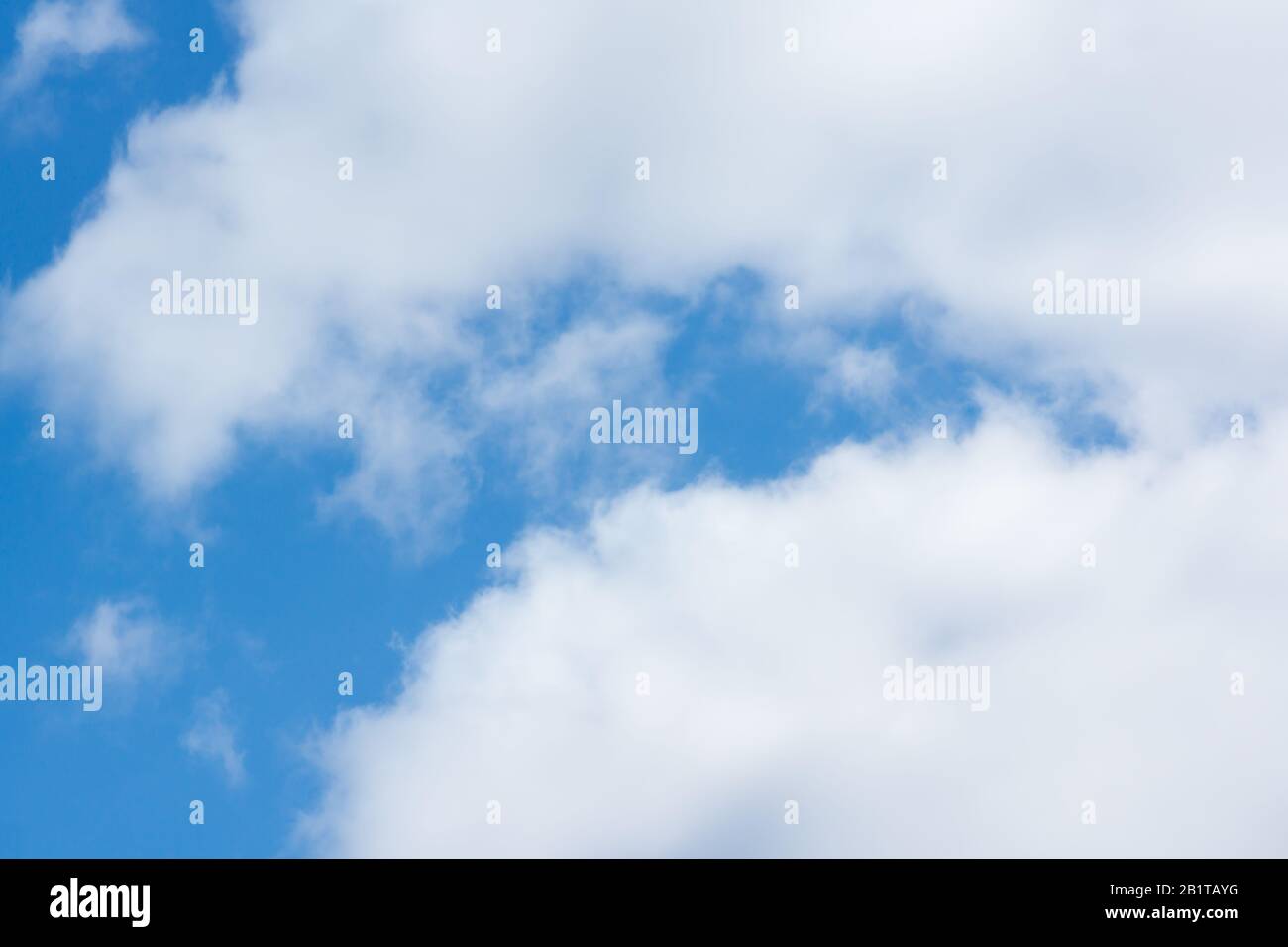 blue sky with flying white light clouds Stock Photo - Alamy
