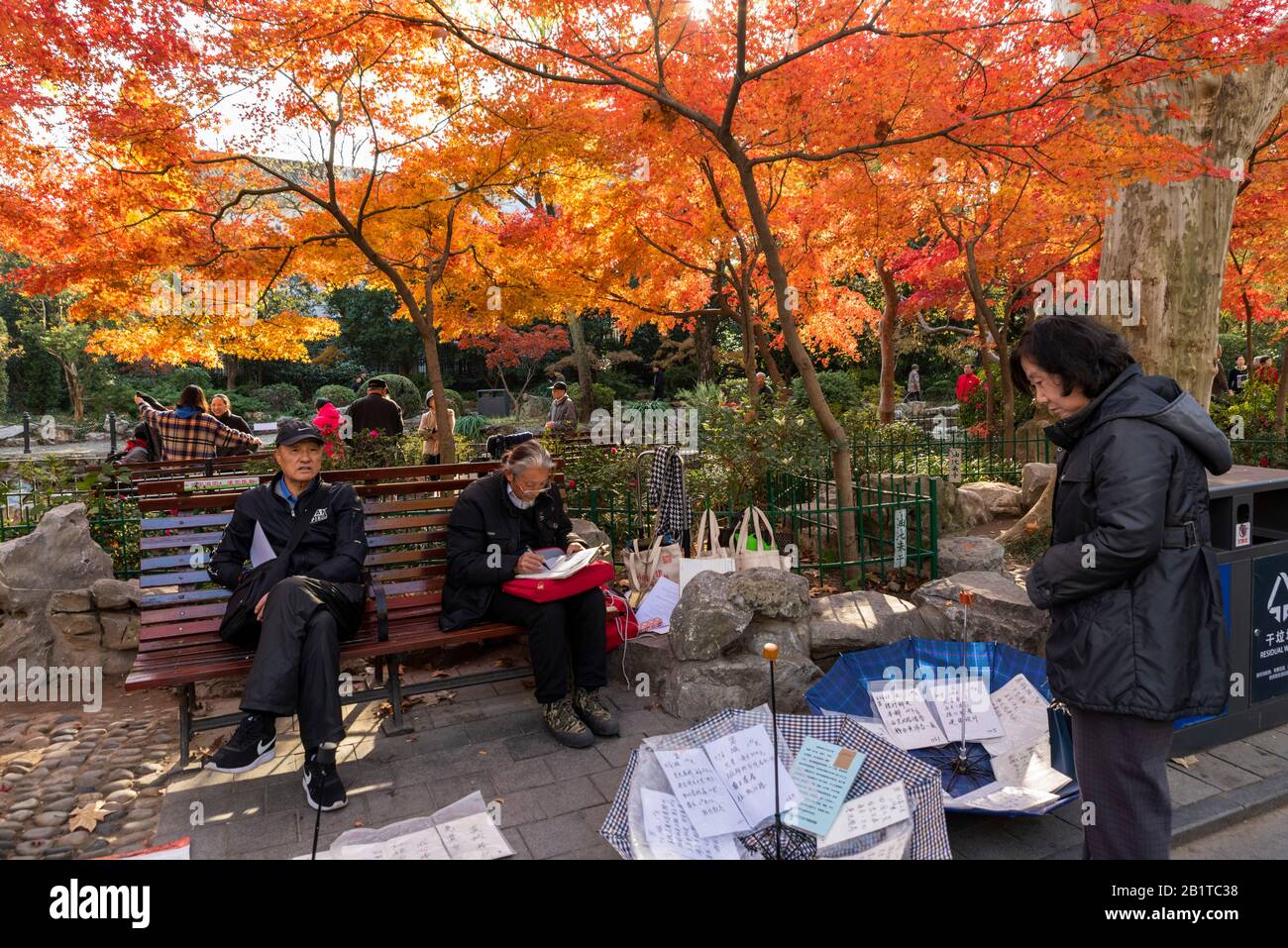 Marriage market in Hong Kou Park in Shanghai. Parents try to find a ...