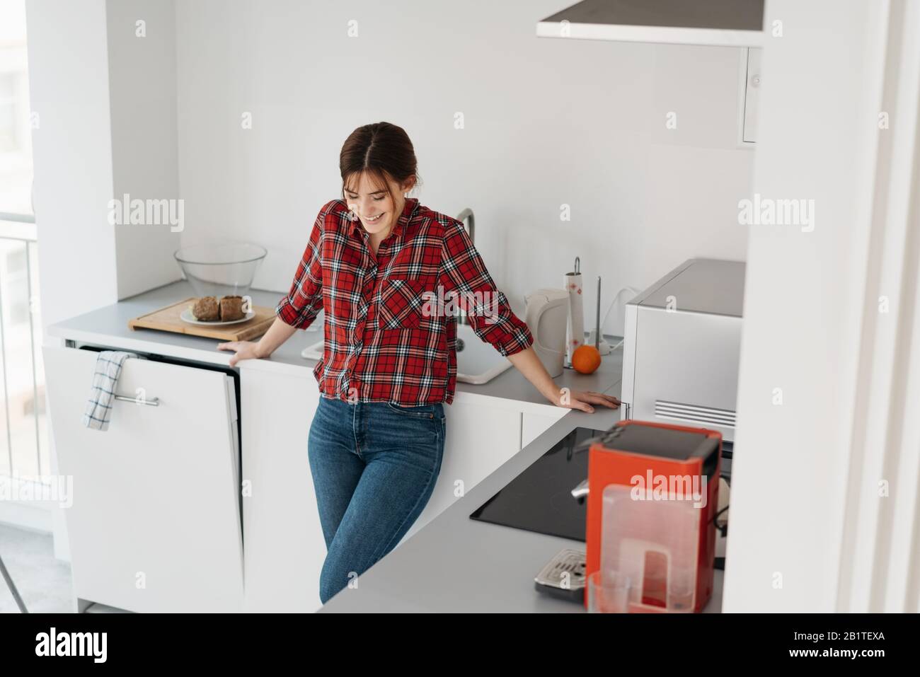 Girl standing on a counter hi-res stock photography and images - Alamy