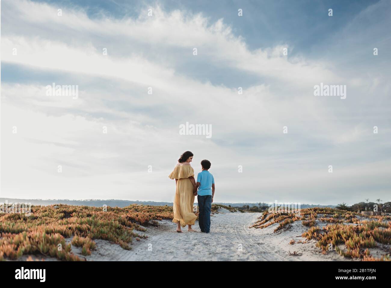 Walking behind mother hi-res stock photography and images - Alamy