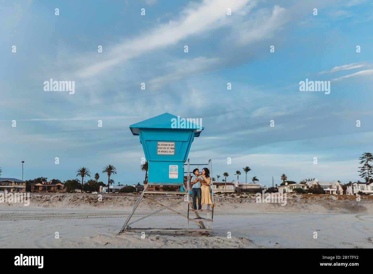 Mother and son sitting outside hi-res stock photography and images - Alamy