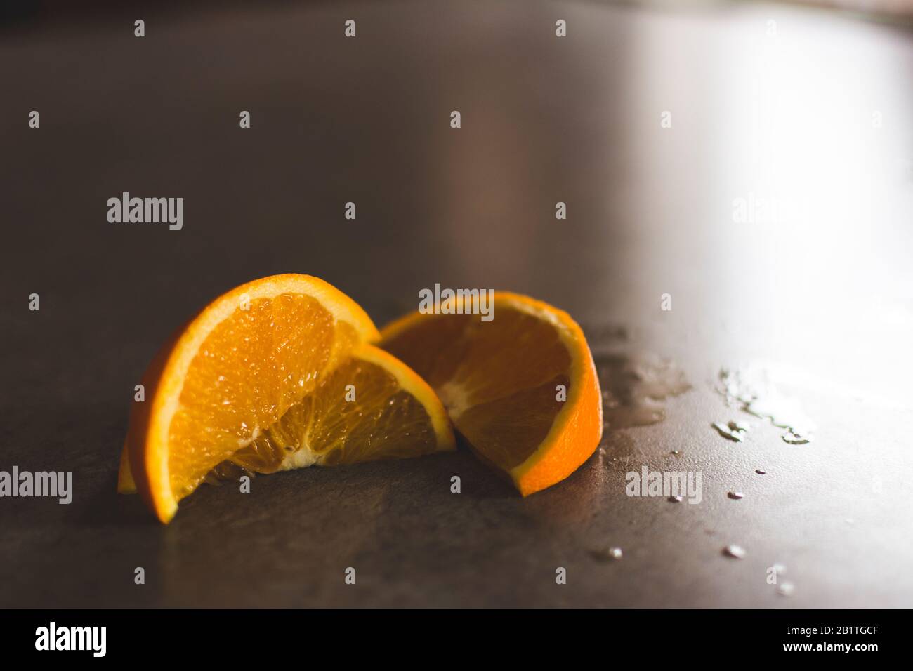 Fresh Cut Oranges on a Counter Top Stock Photo - Alamy