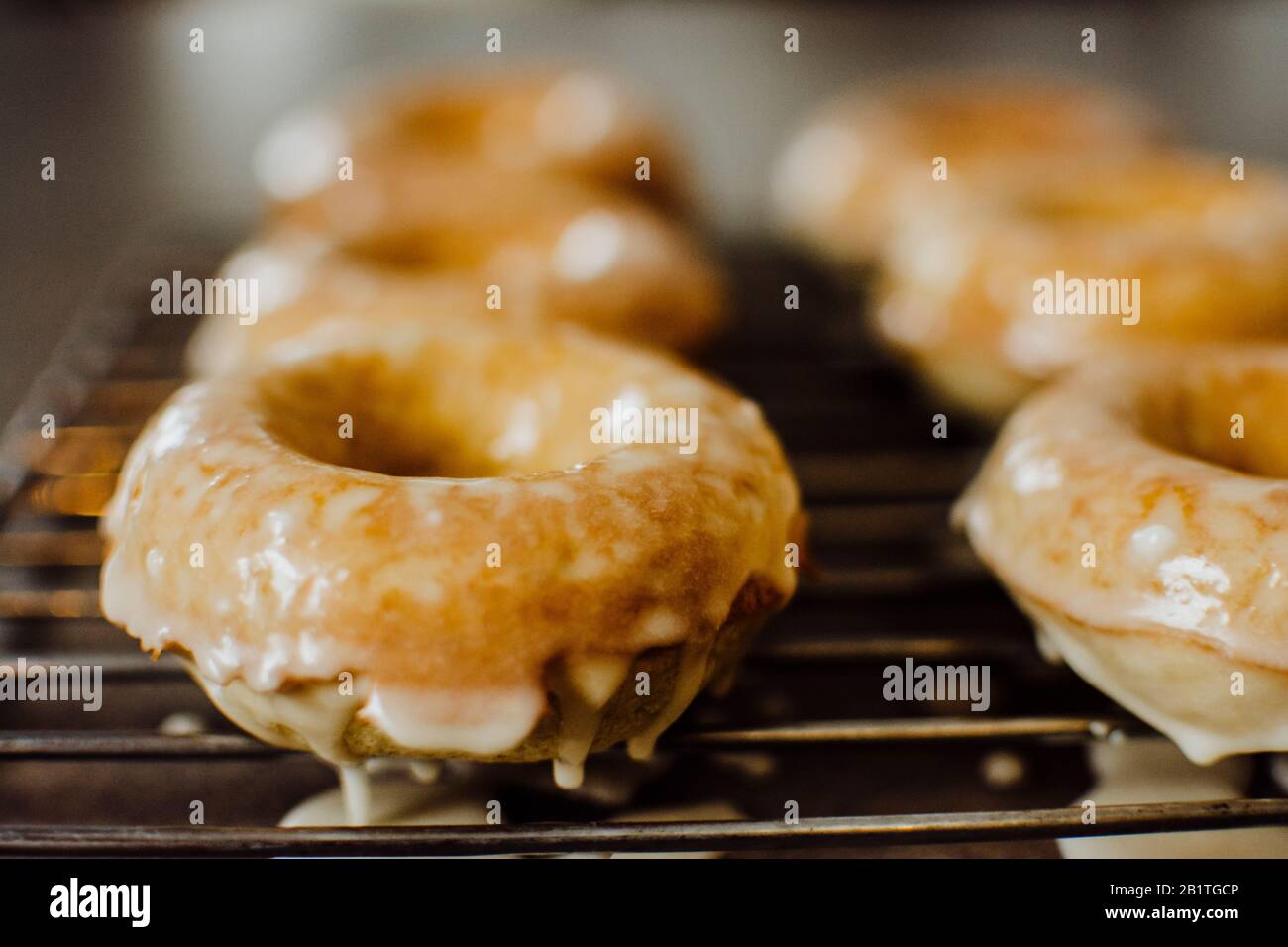Fresh Home Baked Doughnuts on a Cooling Rack Stock Photo - Alamy