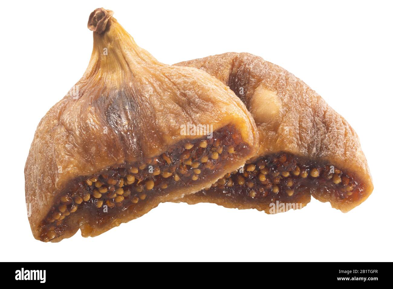 Halved dried fig (Ficus carica fruit), isolated Stock Photo - Alamy