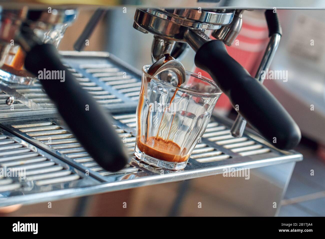 Coffee shop. Espresso machine making shot close-up Stock Photo - Alamy