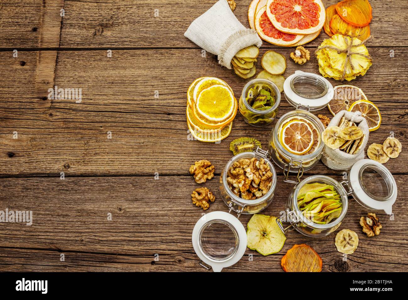 Zero waste food shopping concept. Assortment of dried fruits, walnuts ...