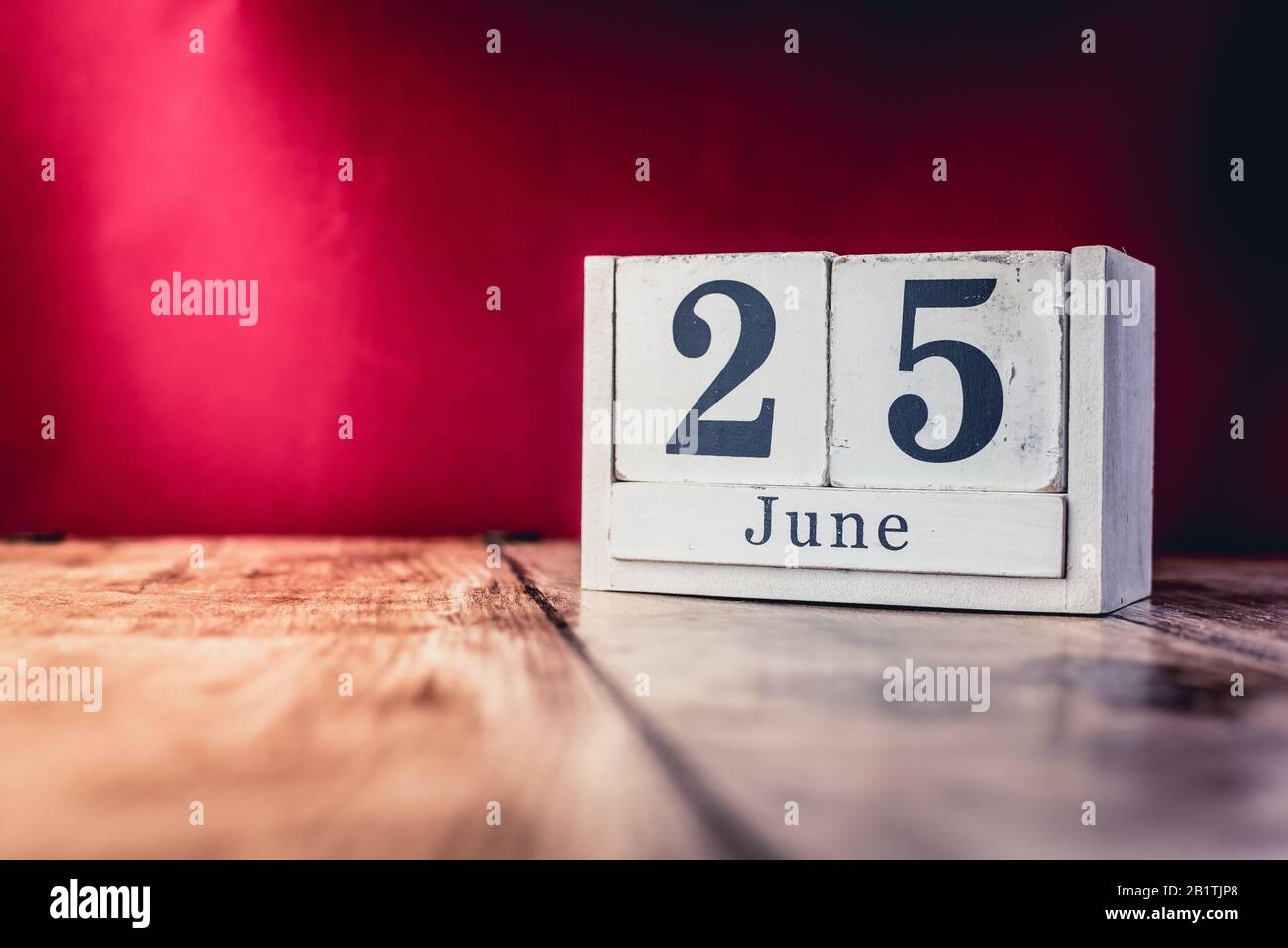June 25th. Day 25 of month, calendar on business office table ...