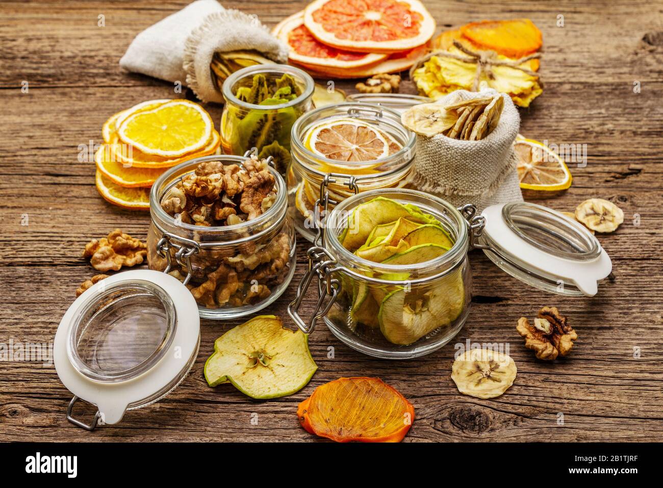 Zero waste food shopping concept. Assortment of dried fruits, walnuts ...