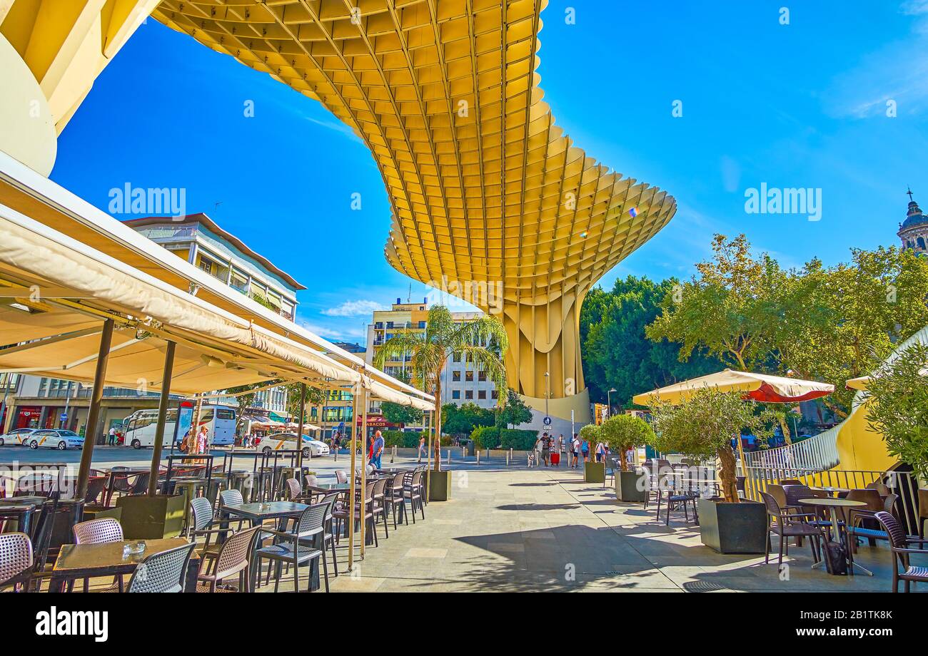 SEVILLE, SPAIN - OCTOBER 1, 2019: The outdoor terrace of the restaurant ...