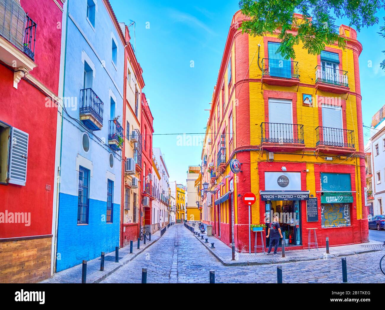 SEVILLE, SPAIN - OCTOBER 1, 2019: The narrow historical house in silent ...