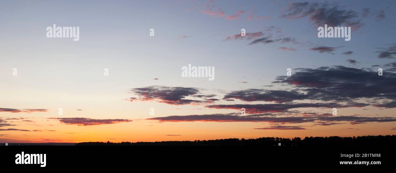 Sunset moody sky with clouds Stock Photo - Alamy