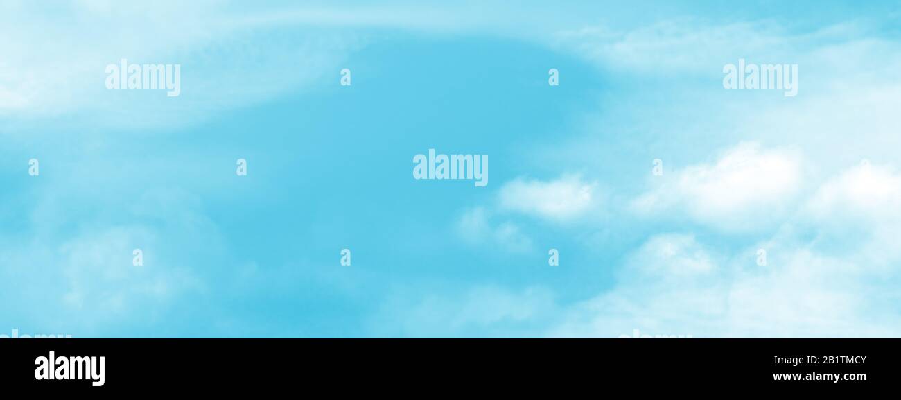 Abstract sunny sky with clouds texture wide background Stock Photo - Alamy