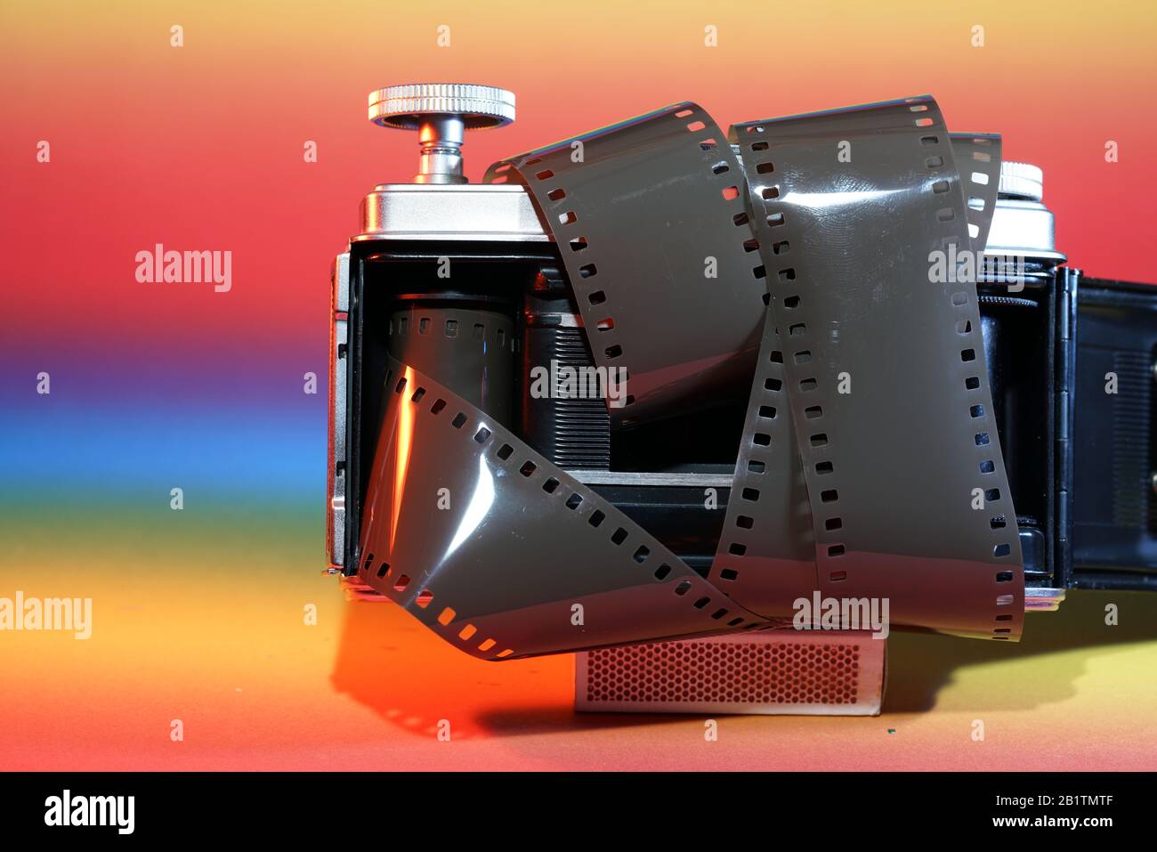 Film of an analogue camera with colorful background photographed in the ...