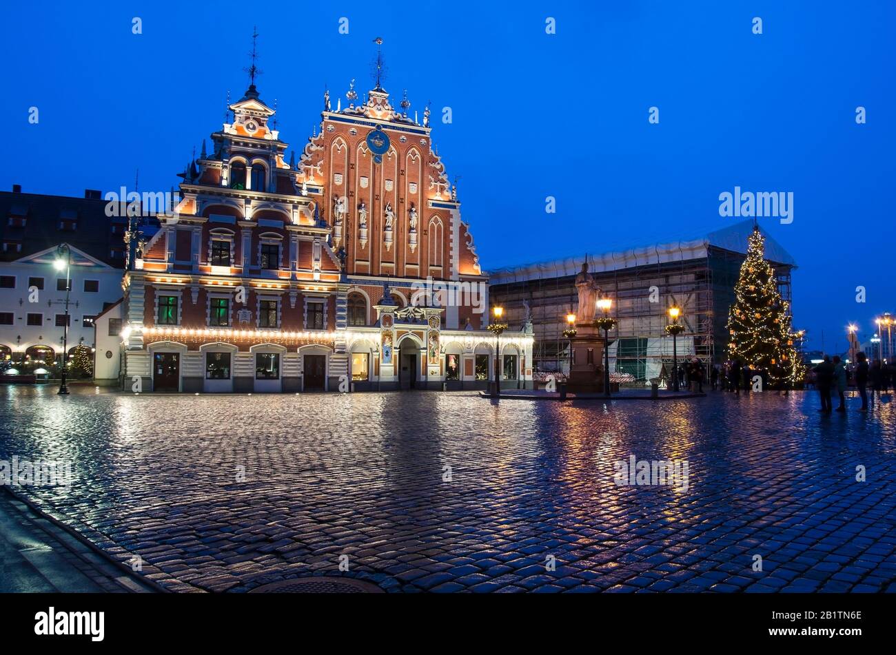 View of famous House of the Black Heads illuminated at night and ...