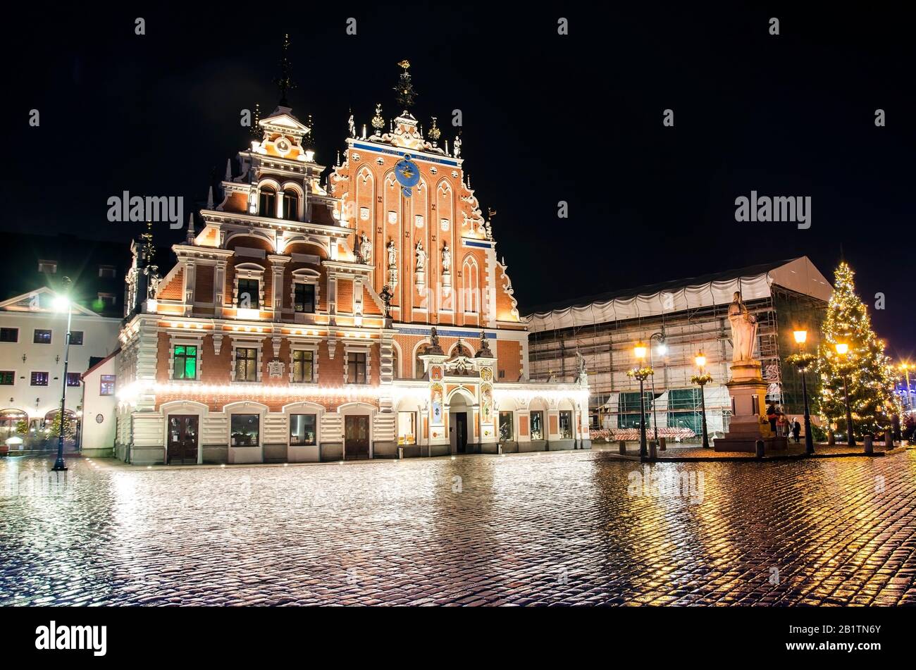View of famous House of the Black Heads illuminated at night and ...