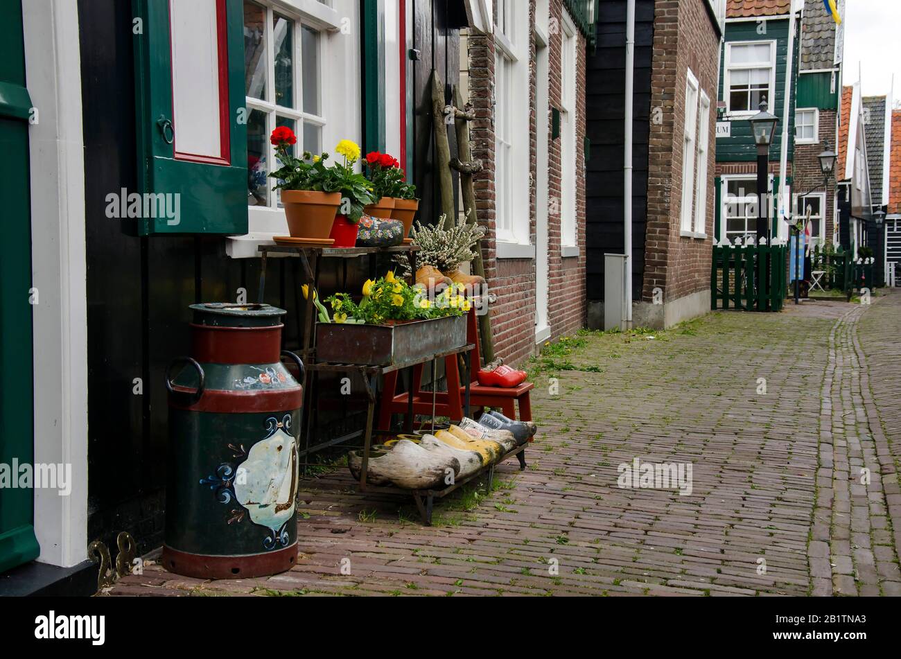 Traditional dutch wooden shoes - klompen (clogs), can and flower pots ...